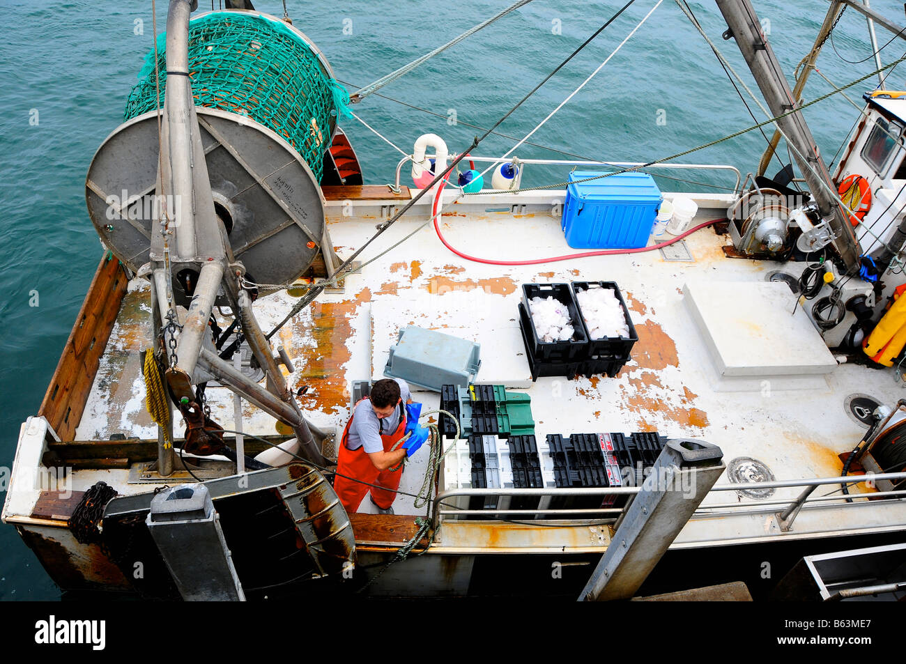 Fishing boat unloading it's catch, Chatham, Cape Cod, USA Stock Photo ...