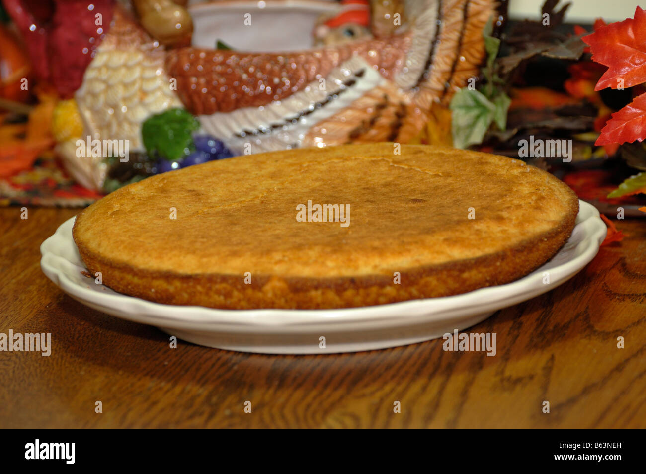 Cornbread on a serving plate This bread was baked southern style in a ...