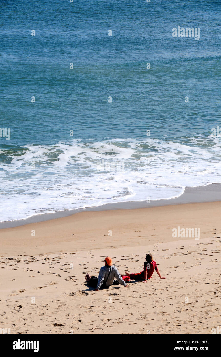 People on beach looking out to sea, Cape Cod, USA Stock Photo - Alamy