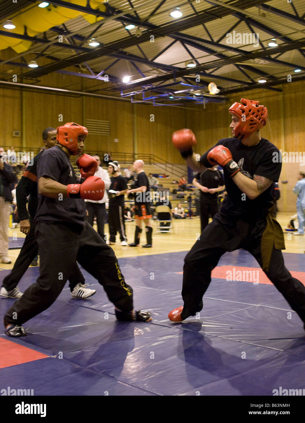 Competitors fighting in a kung fu tournament Stock Photo - Alamy