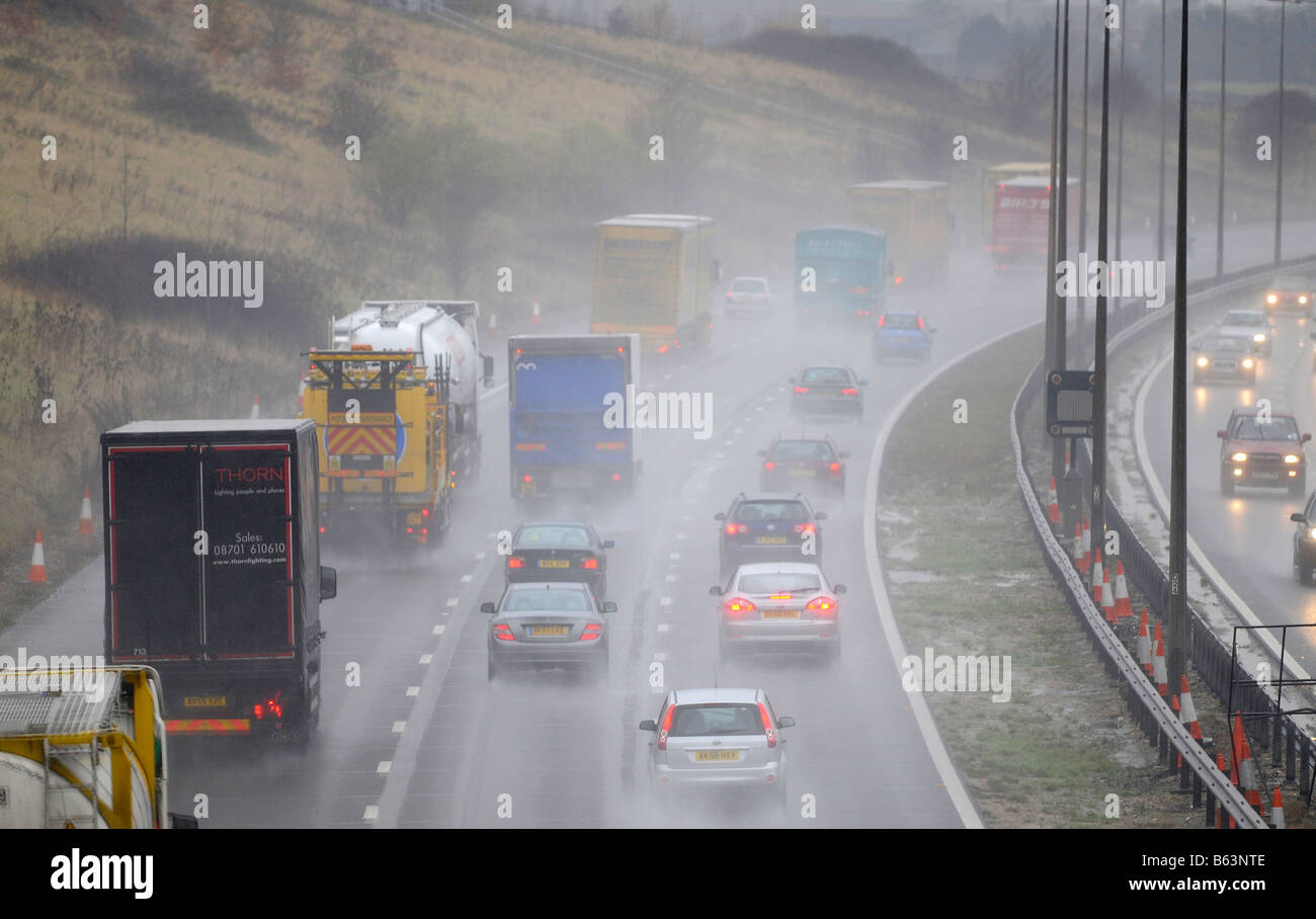 Motorway traffic in the rain 28 11 2008 Credit Garry Bowden Stock Photo ...