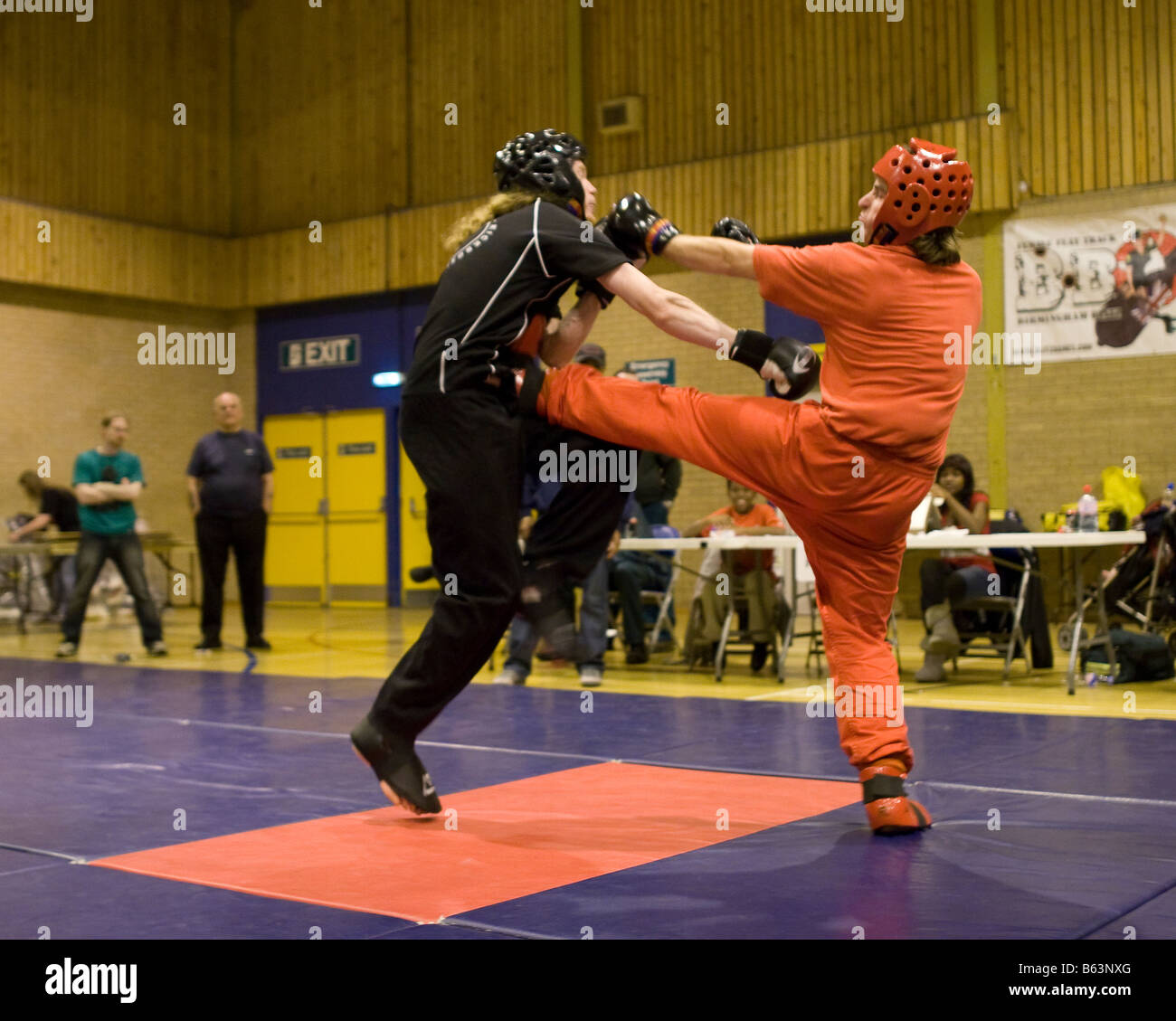 Competitors fighting in a kung fu tournament Stock Photo - Alamy