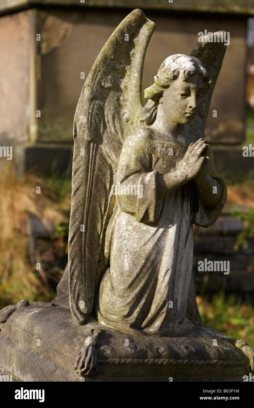 Angel in cemetery Stock Photo - Alamy