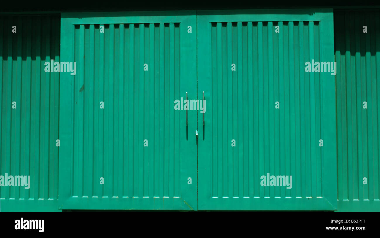 Green door shutters hi-res stock photography and images - Alamy