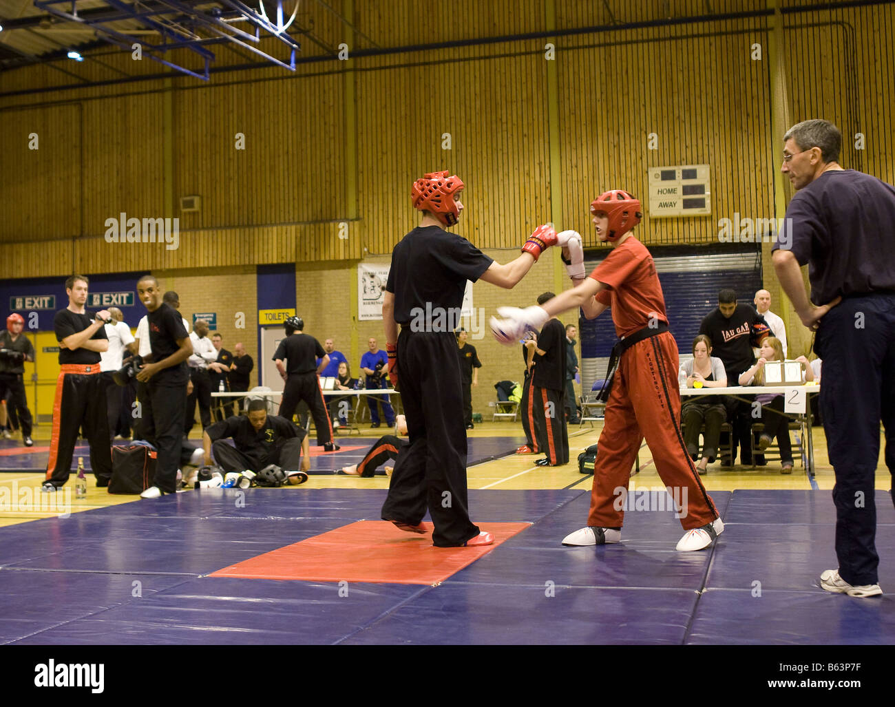 Competitors fighting in a kung fu tournament Stock Photo - Alamy
