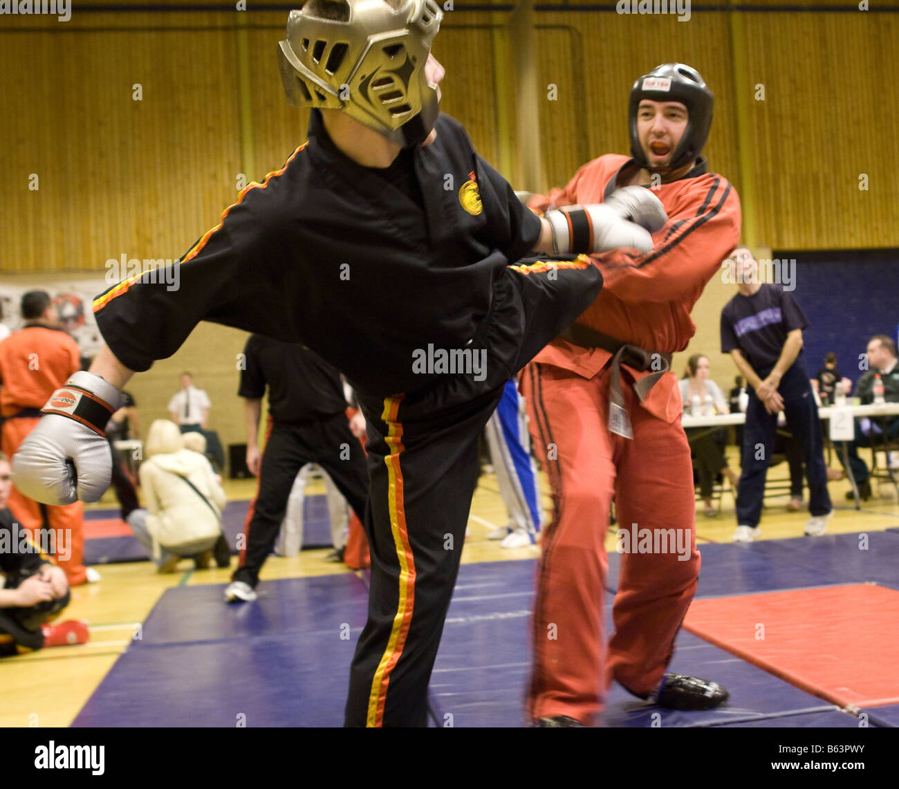Competitors fighting in a kung fu tournament Stock Photo - Alamy