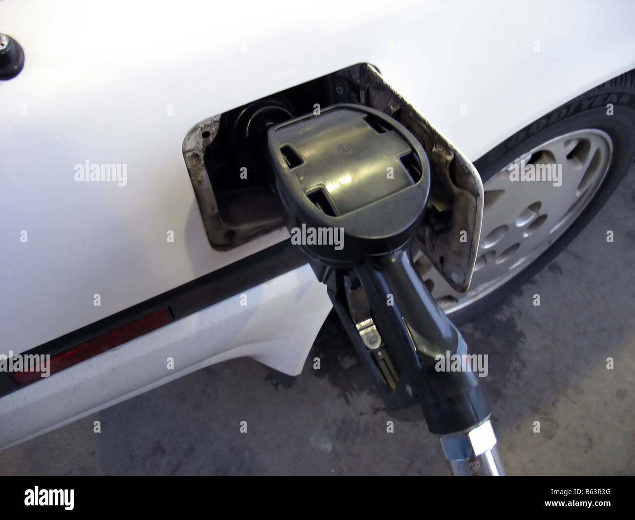 pumping gas at the gas station Stock Photo - Alamy