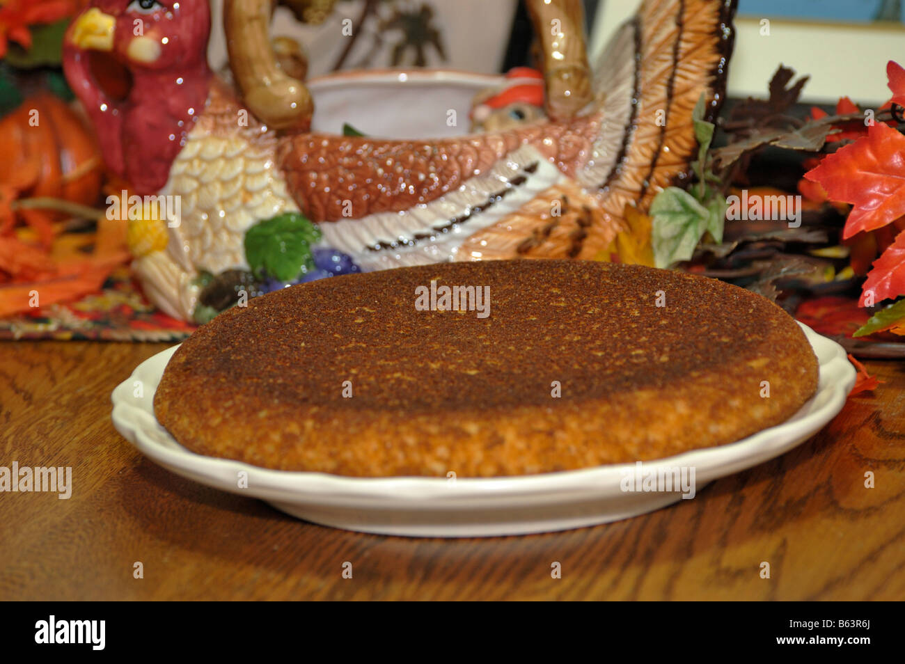 Cornbread on a serving plate This bread was baked southern style in a ...