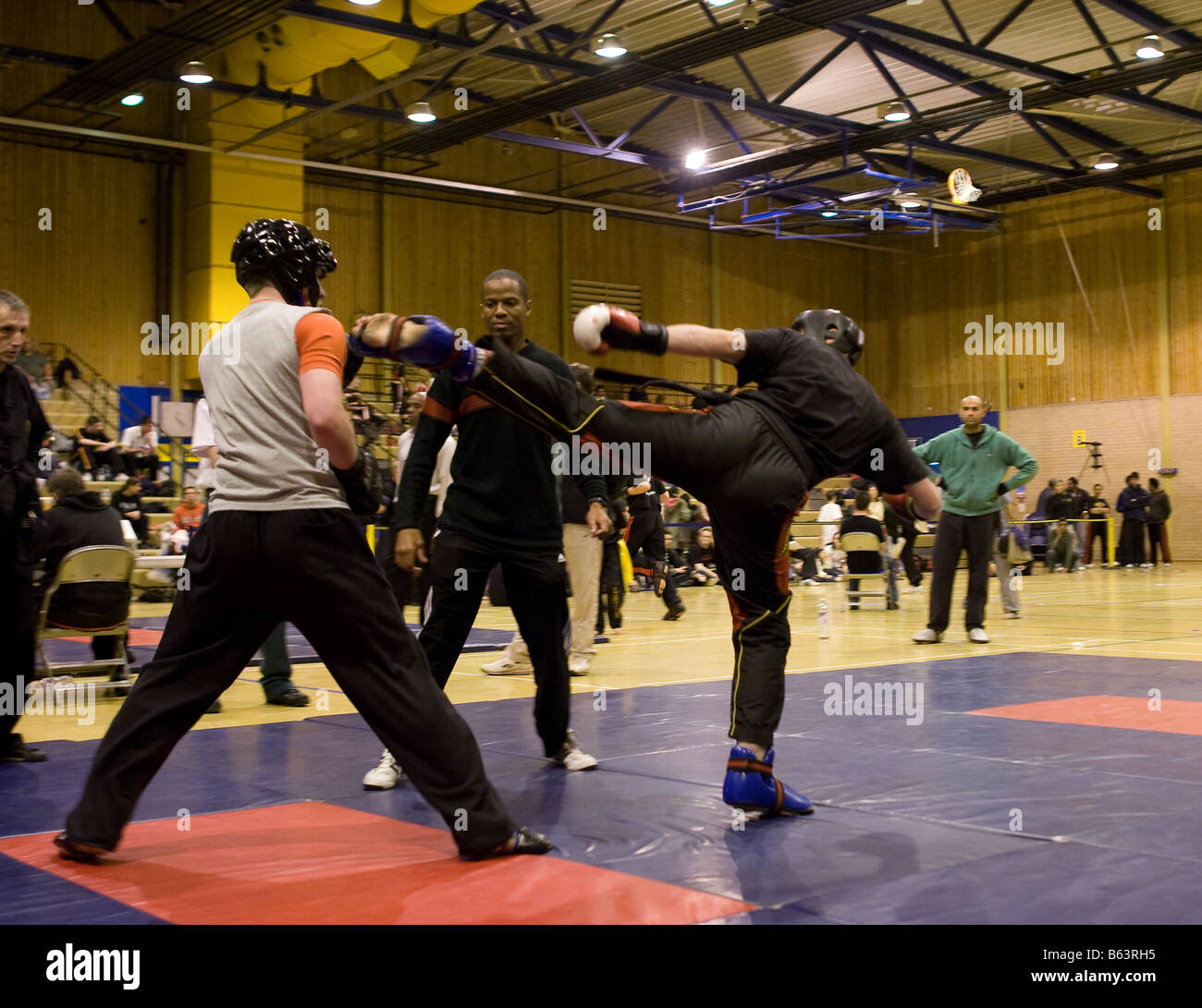 Competitors fighting in a kung fu tournament Stock Photo - Alamy