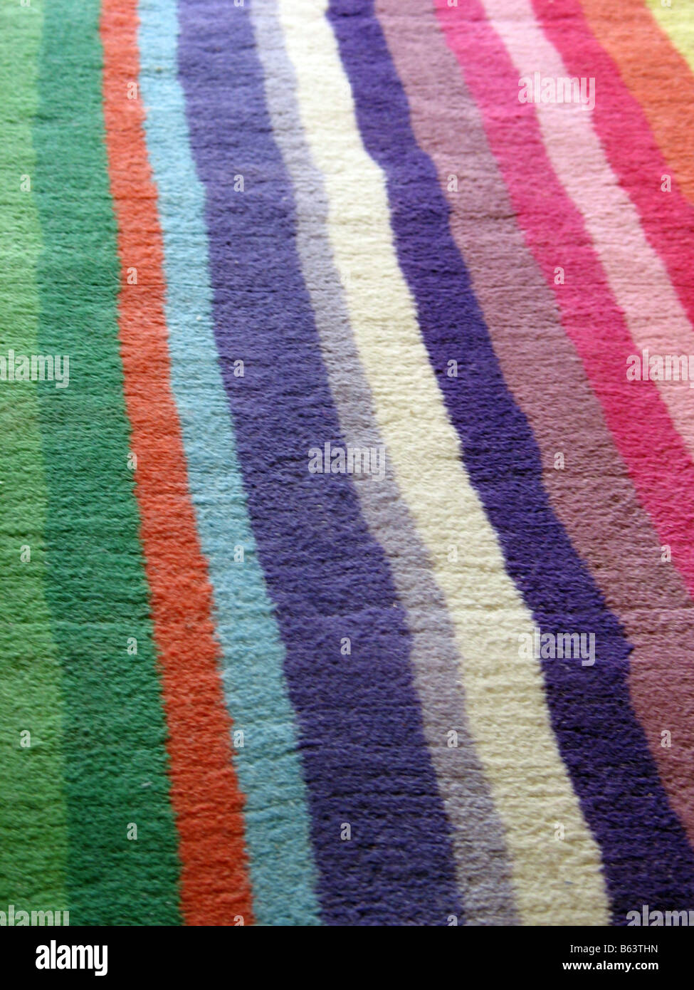 a really colorful carpet Stock Photo - Alamy