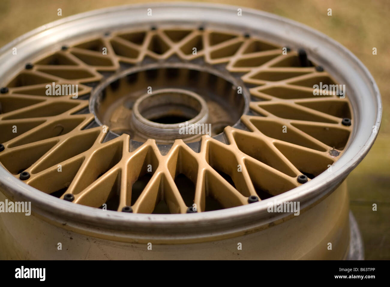 A custom gold rim with polished silver lip tire removed Shallow depth ...