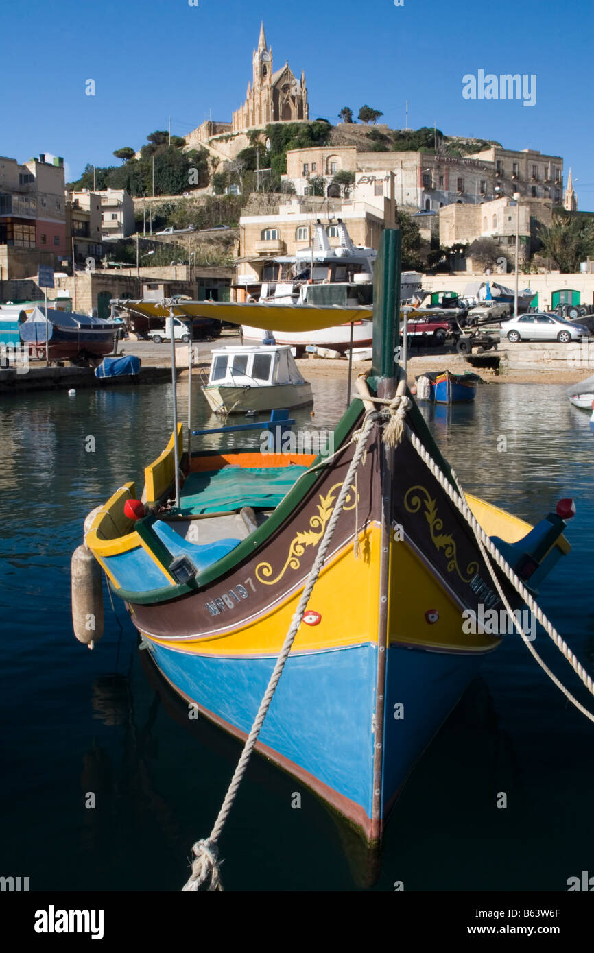 Traditional fishing boat at Mgarr Harbour in Gozo, Malta Stock Photo ...