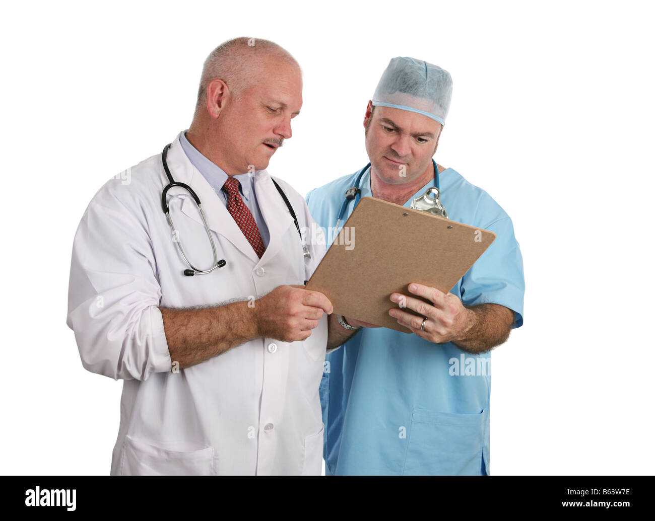 Two doctors confering together on the best treatment course for a ...