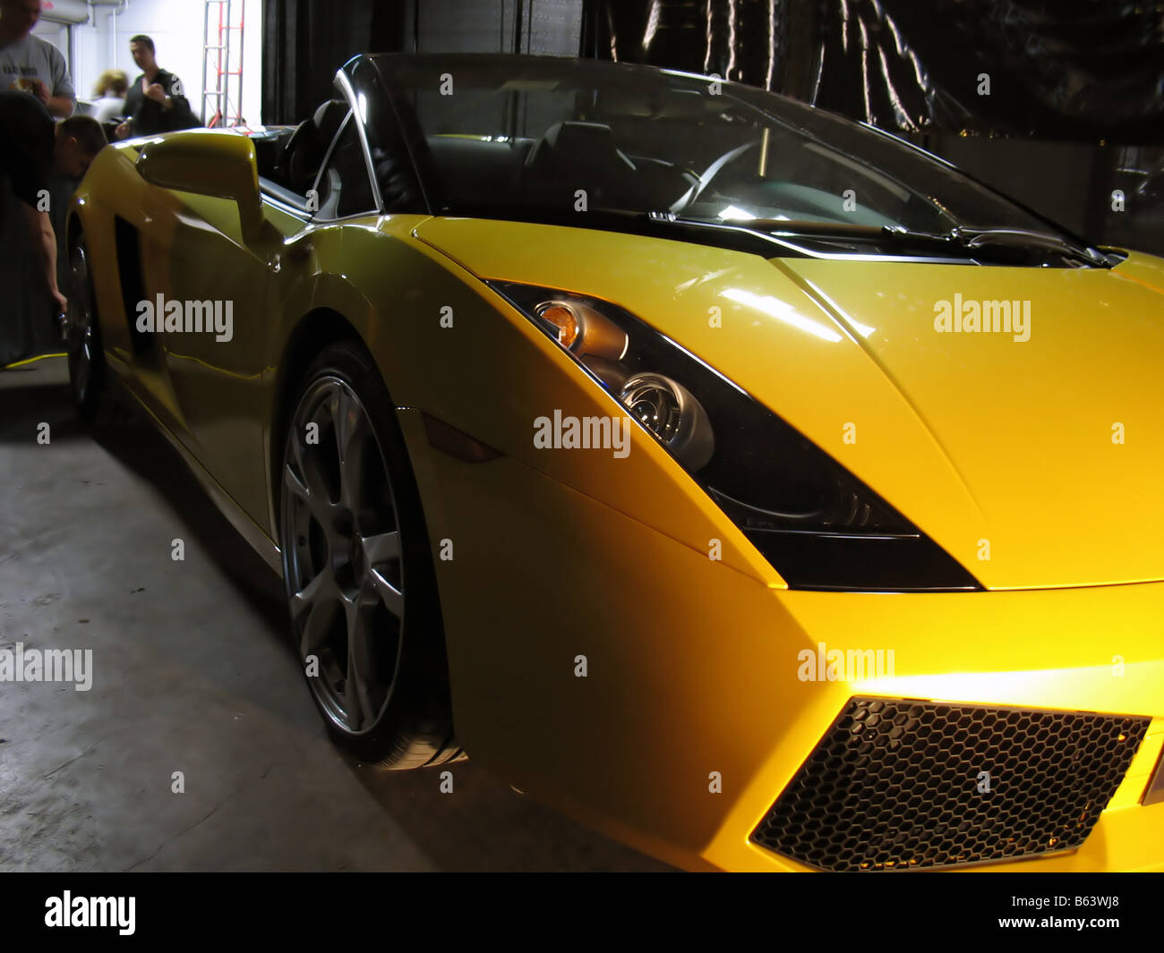 An exotic yellow sports car Stock Photo - Alamy
