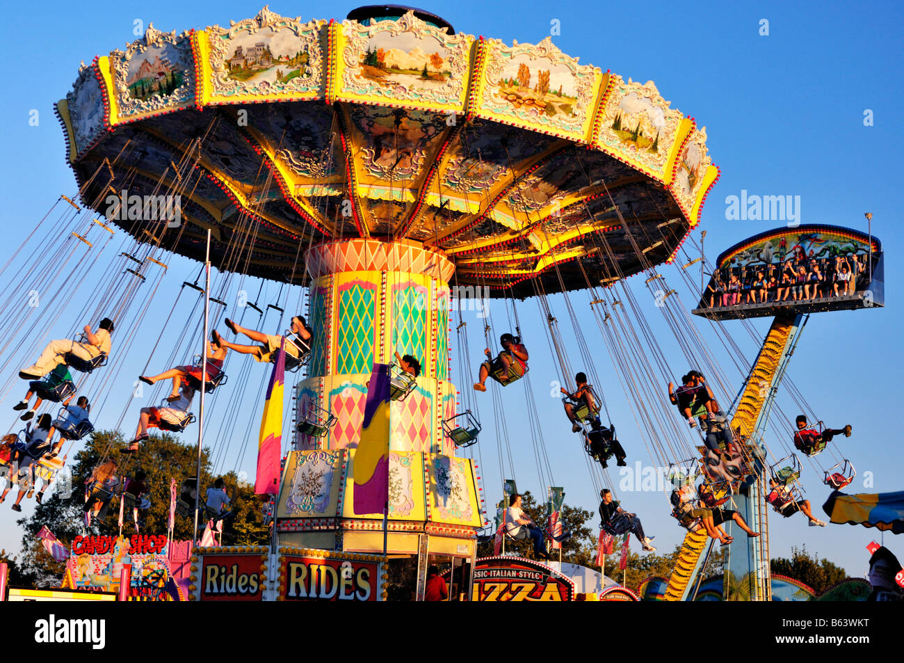 Rotating swings hi-res stock photography and images - Alamy