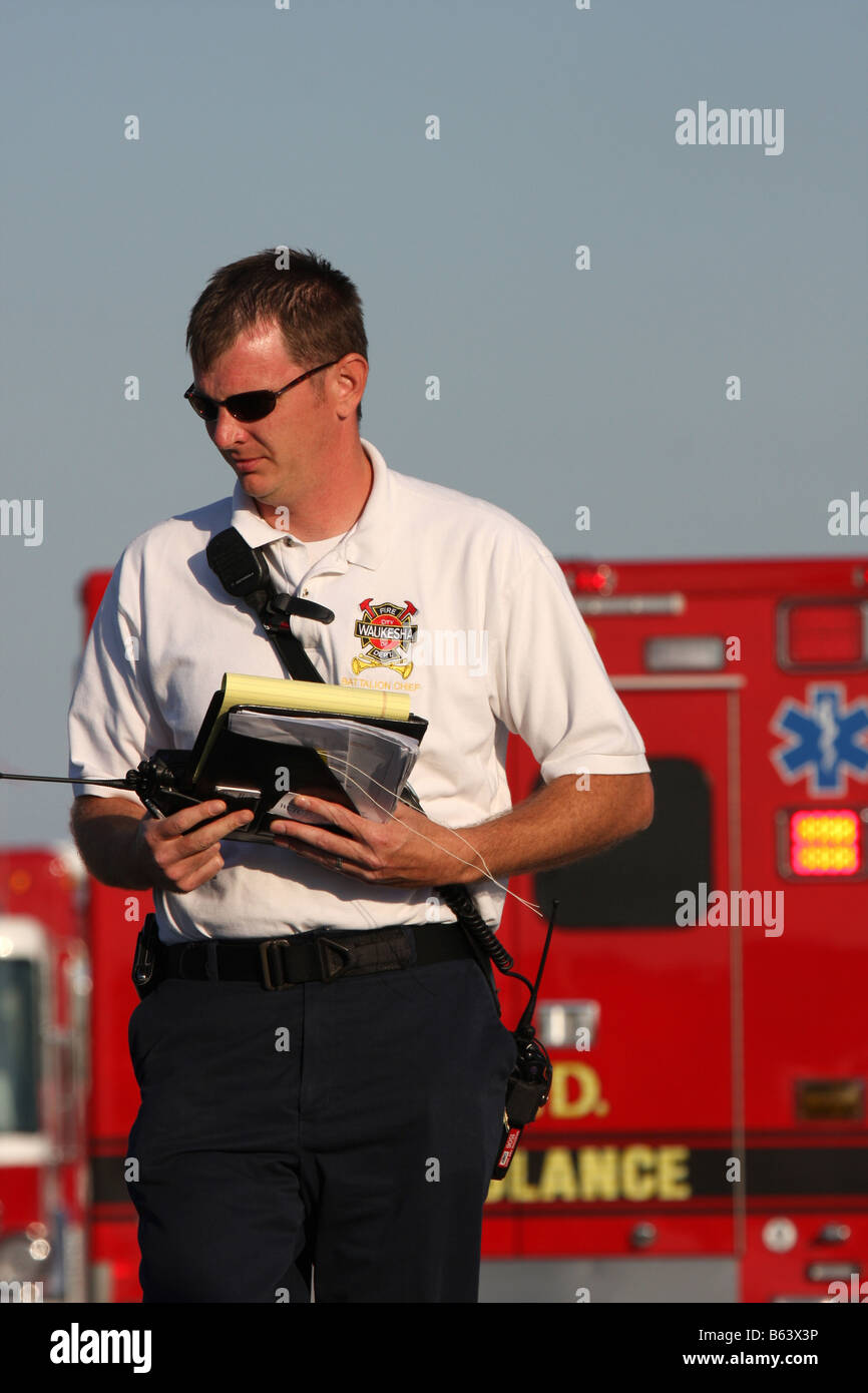 City of Waukesha Wisconsin Fire Department Battalion Chief walking with ...