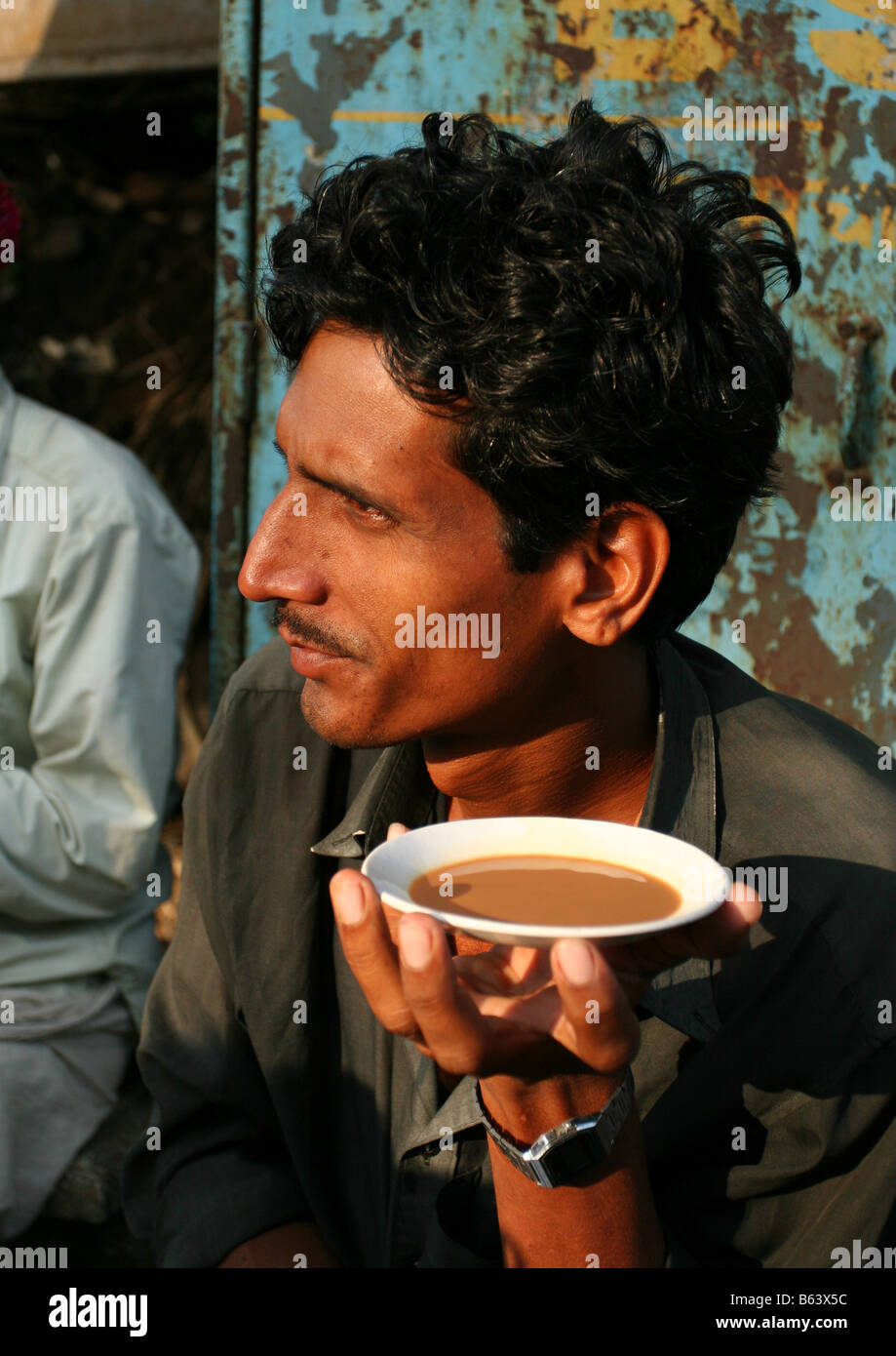 Indian man drinking chai tea hi-res stock photography and images - Alamy