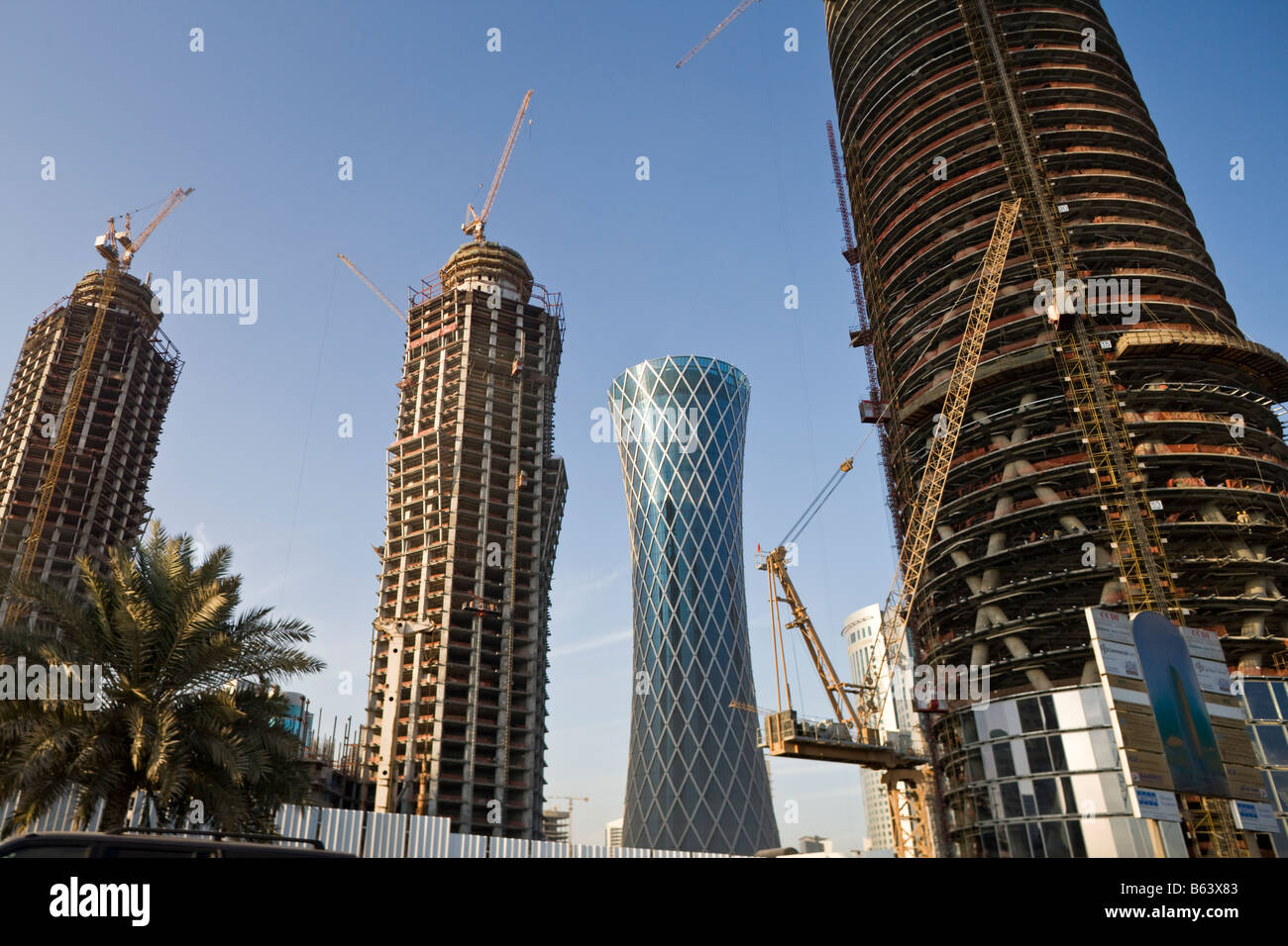 construction of highrise buildings in Doha, Qatar Stock Photo - Alamy