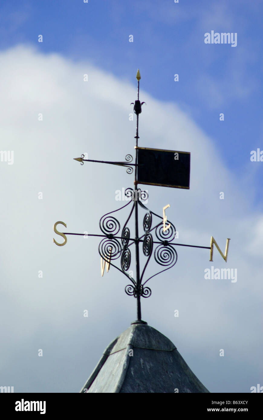 image of a weather vane on a roof Stock Photo - Alamy