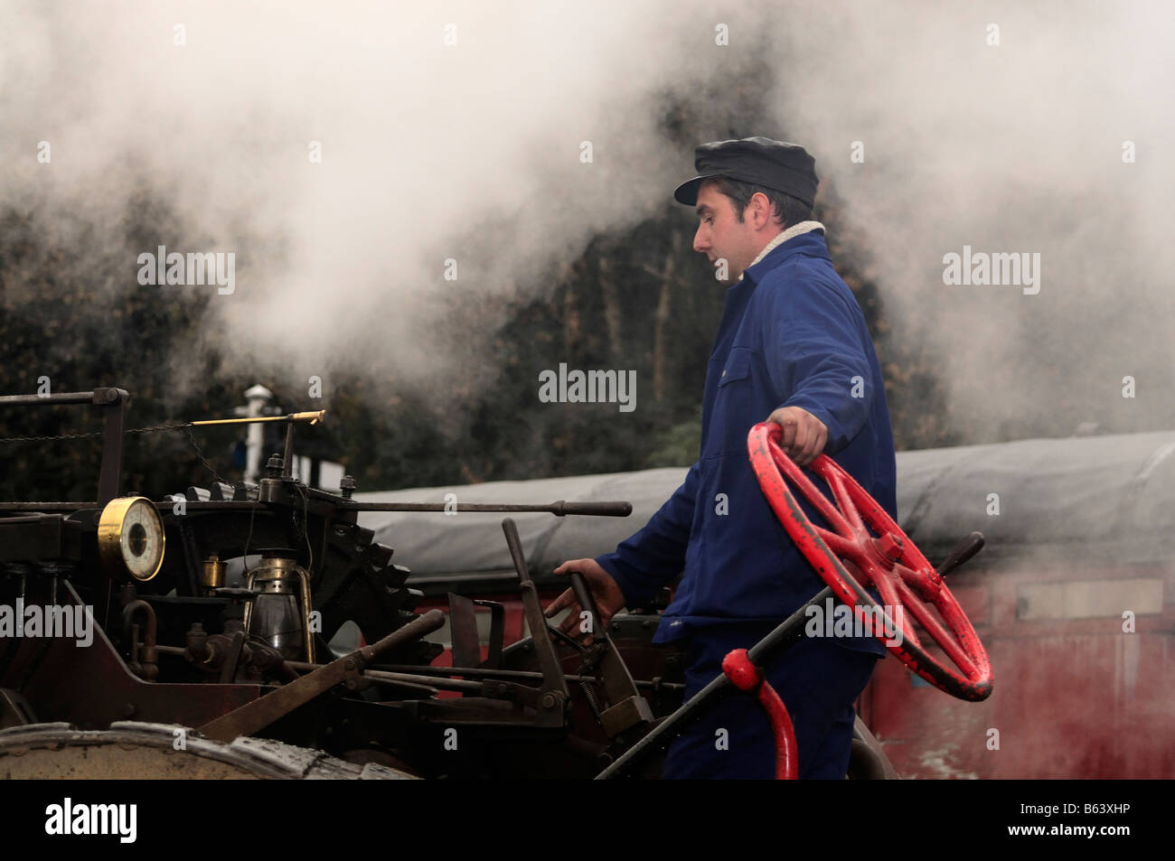 Traction Engine driver working Stock Photo - Alamy