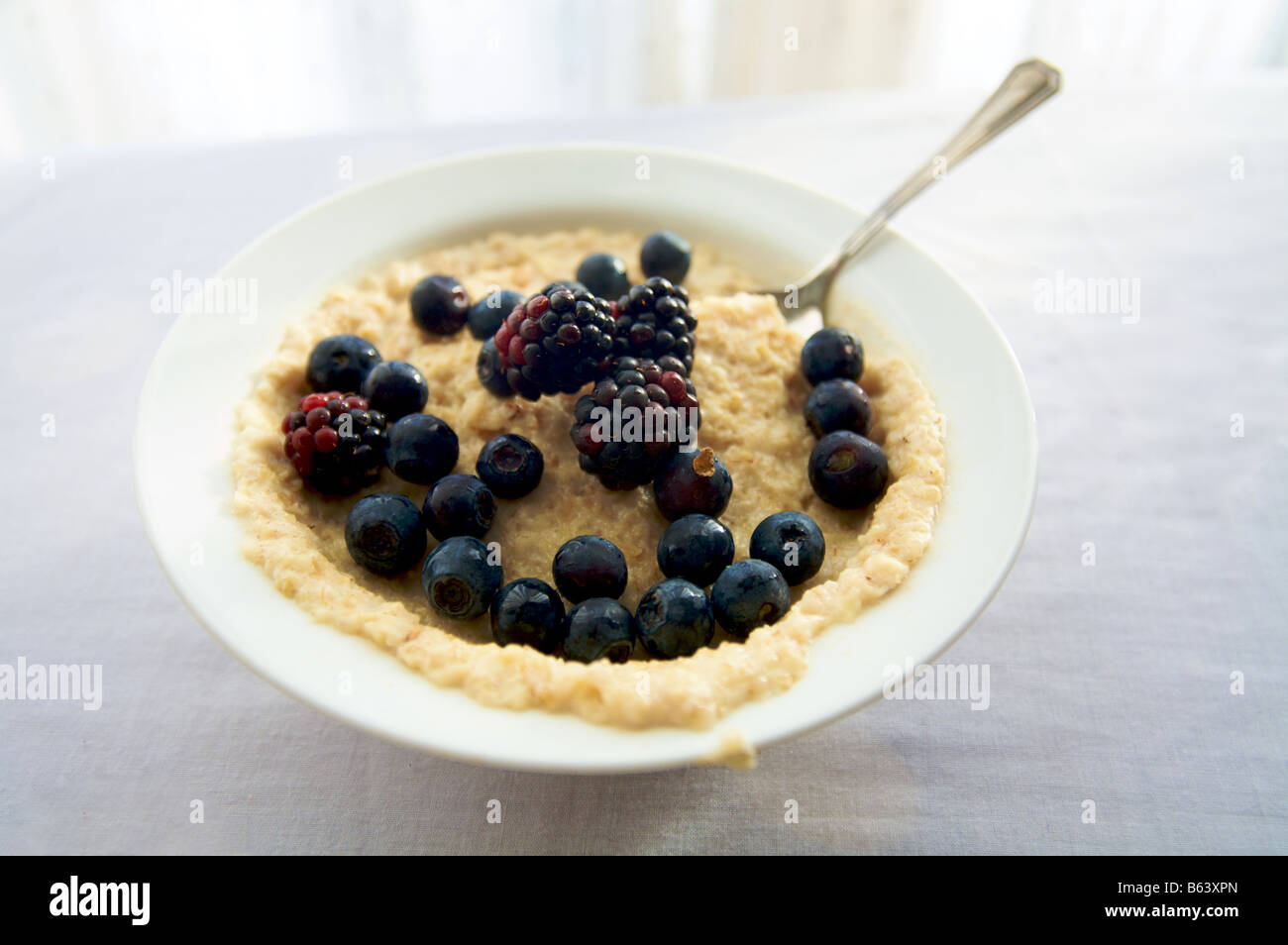White bowl fruit porridge hi-res stock photography and images - Alamy
