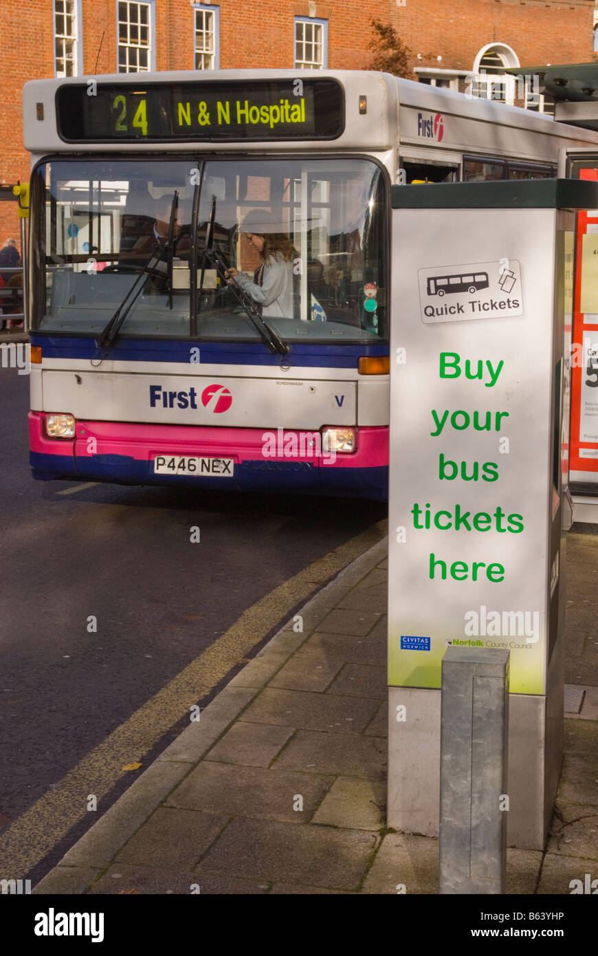 Buy your tickets here sign at uk city bus stop Stock Photo - Alamy