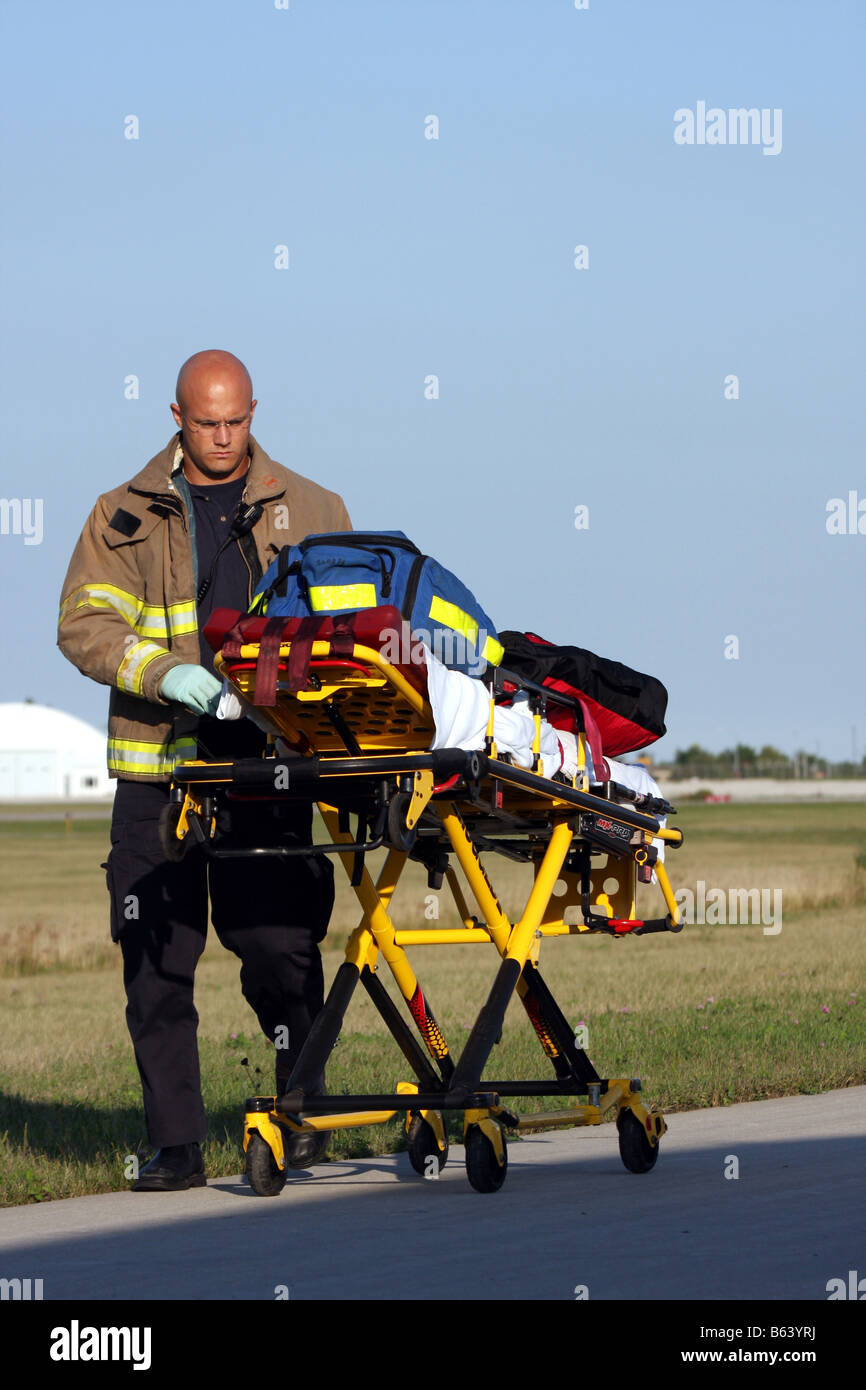 An EMS personnel responding to a mass casualty incident at an airport ...