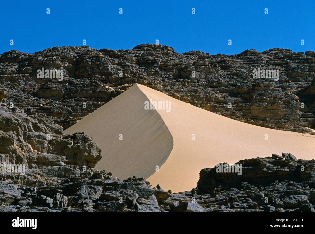 Algeria, near Djanet. Landscape. Sand dunes and rocks. Sahara Desert ...