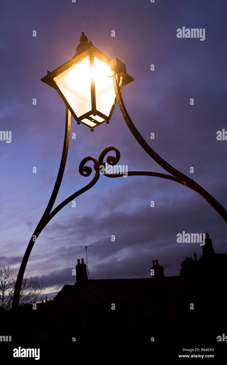 Decorative streetlight on a pedestrian bridge over the River Wansbeck ...