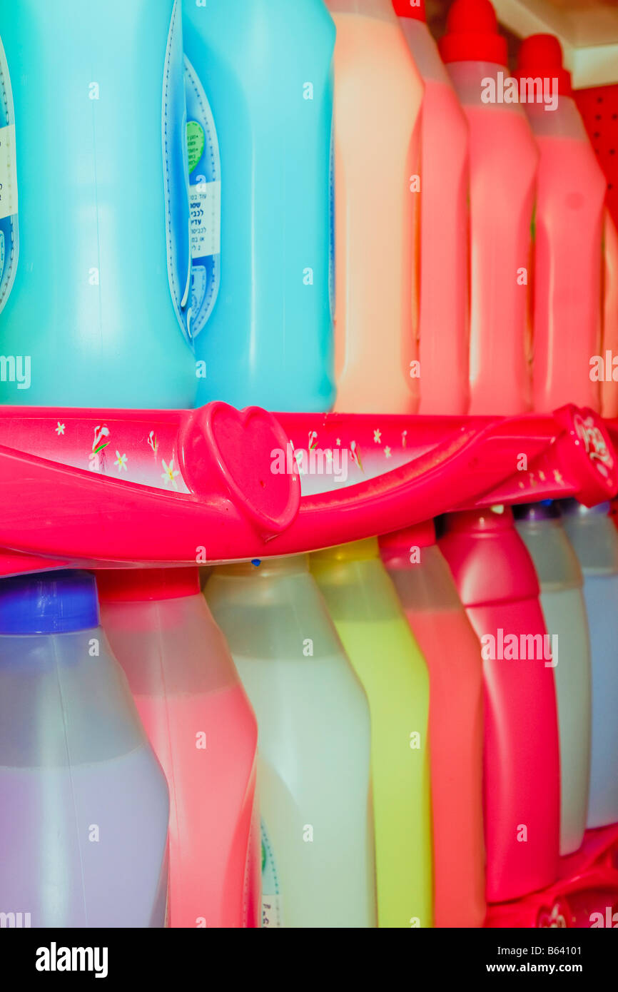 Fabric softener bottles in different colors on a Supermarket shelf. the ...