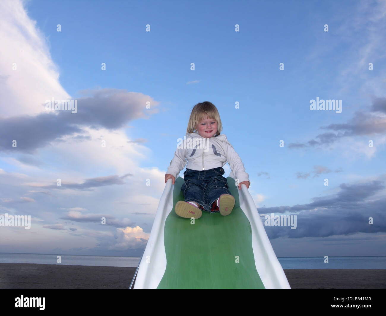 Blonde child slide hi-res stock photography and images - Alamy