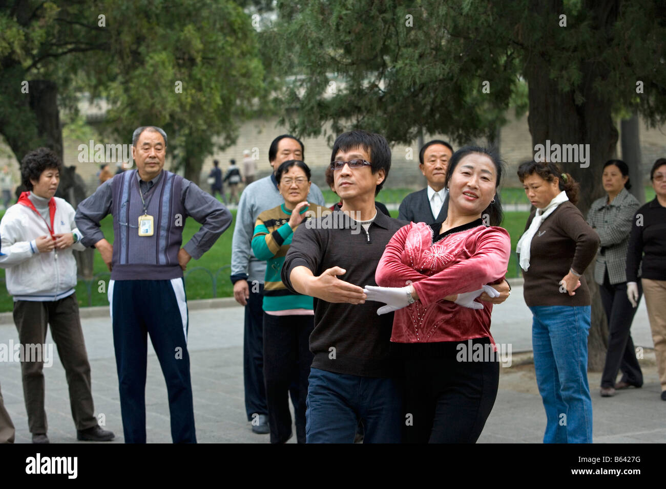 China, Beijing, Temple of Heaven Park. Morning exercises. Ballroom ...