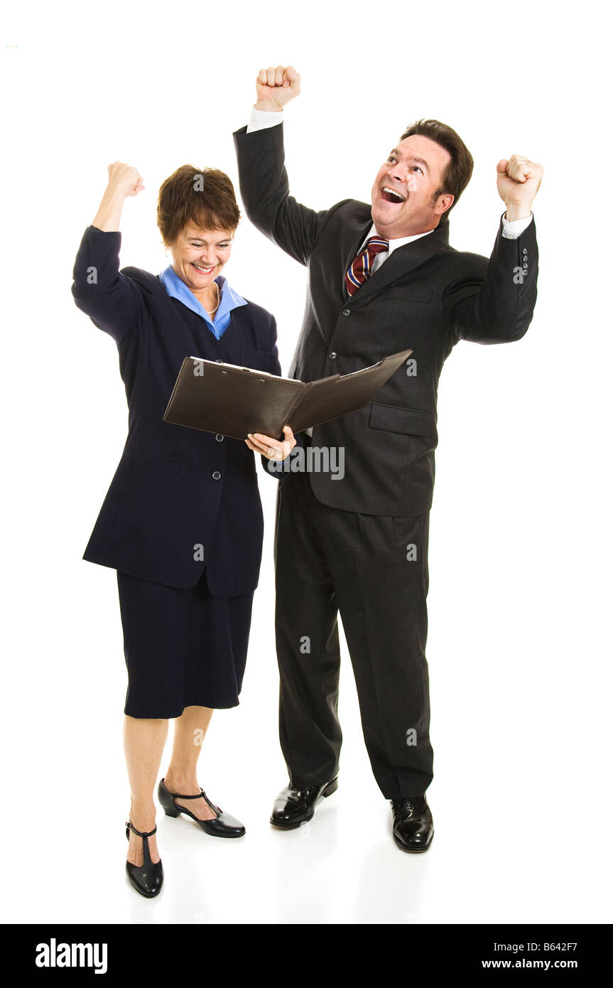 Business people overjoyed by a positive financial report Full body ...