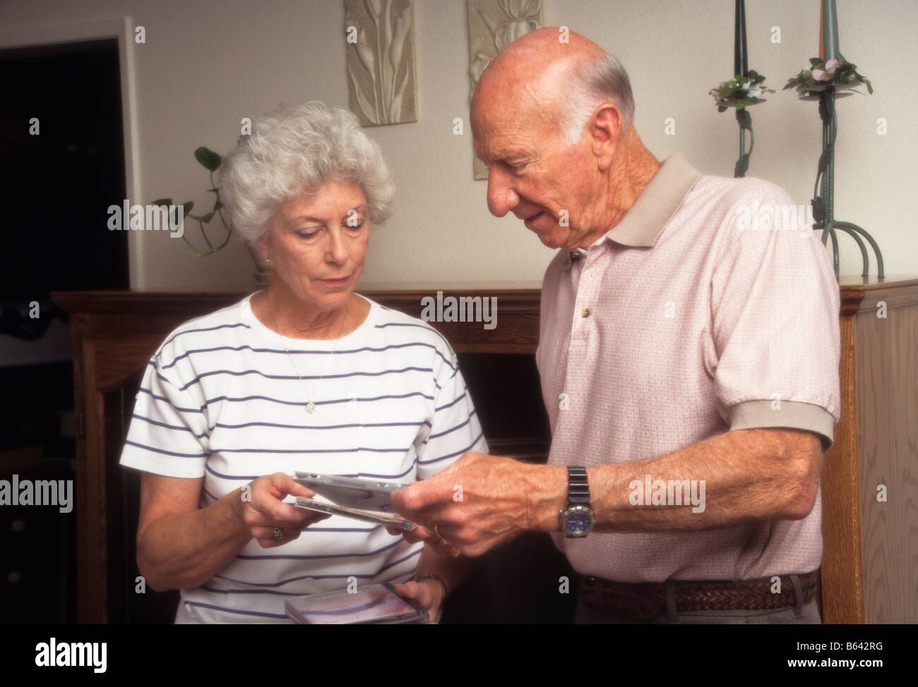 Senior couple maker various choices as a team Stock Photo - Alamy