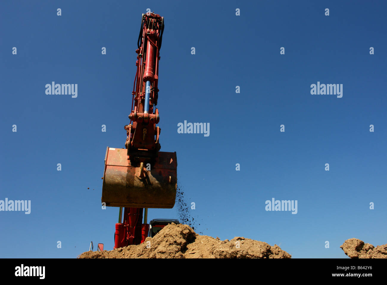 excavator on a building site Stock Photo - Alamy