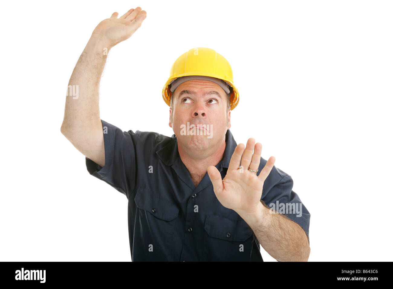 Construction worker trapped in invisible box Isolated on white Stock ...