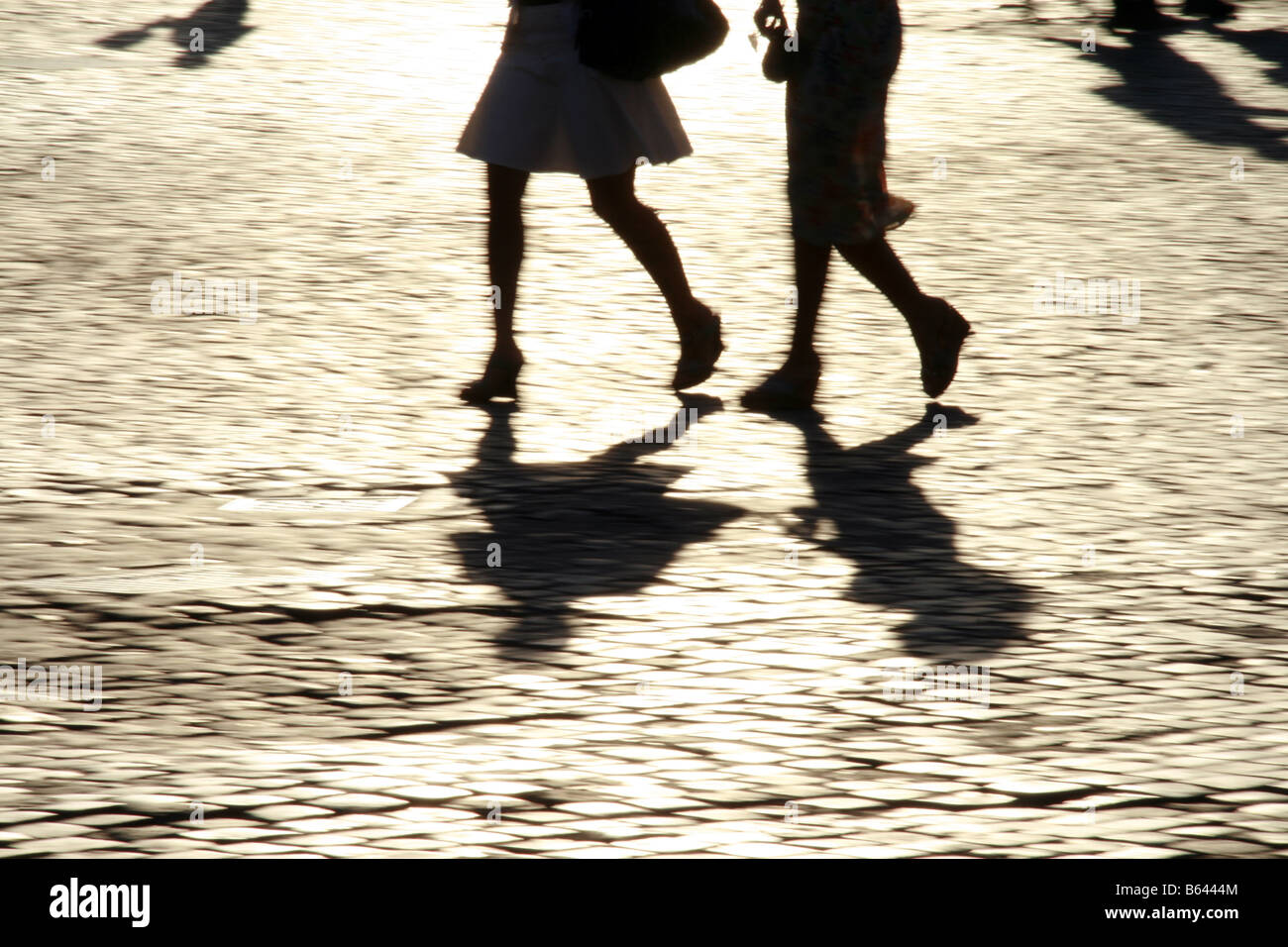 one person walking in street in city town Stock Photo - Alamy