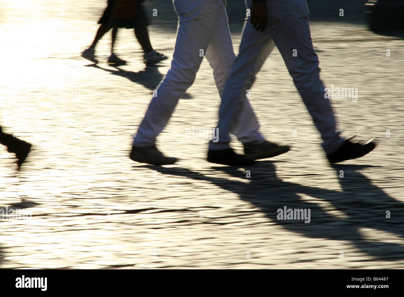 one person walking in street in city town Stock Photo - Alamy