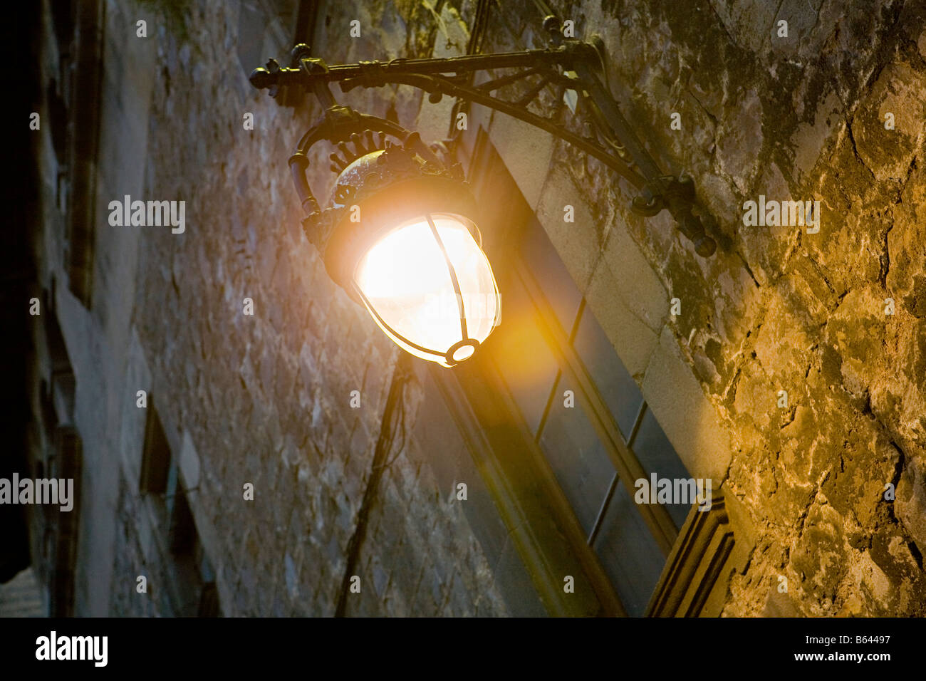An old street light in the old side street of Barcelona Stock Photo - Alamy