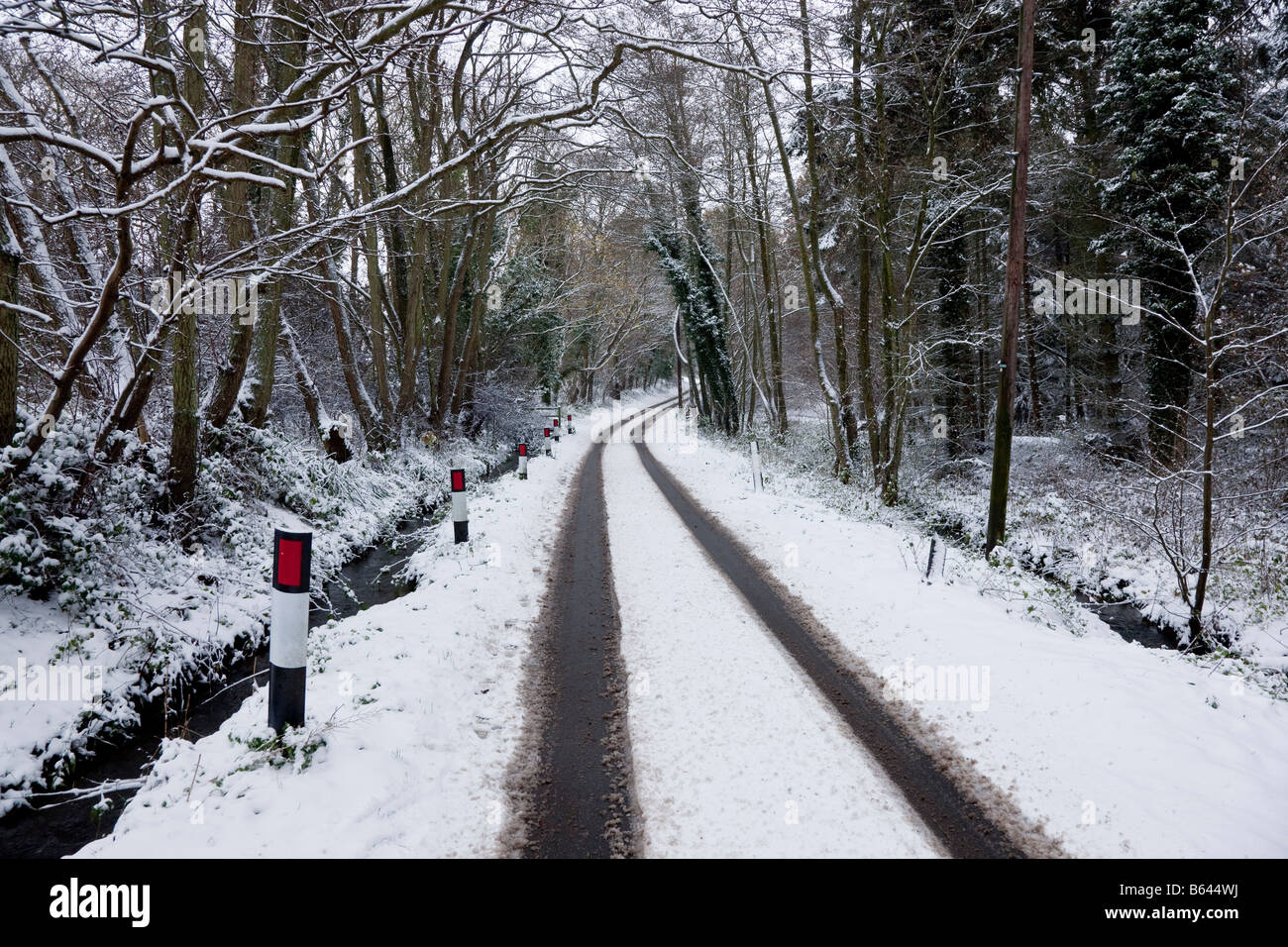 Tracks in light covering of snow hi-res stock photography and images ...