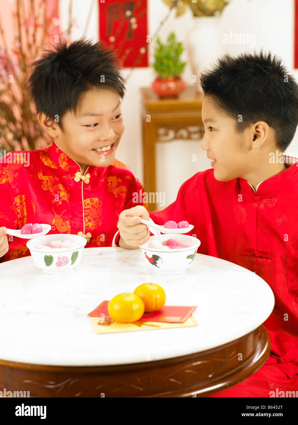 boys eating sticky rice balls Stock Photo - Alamy