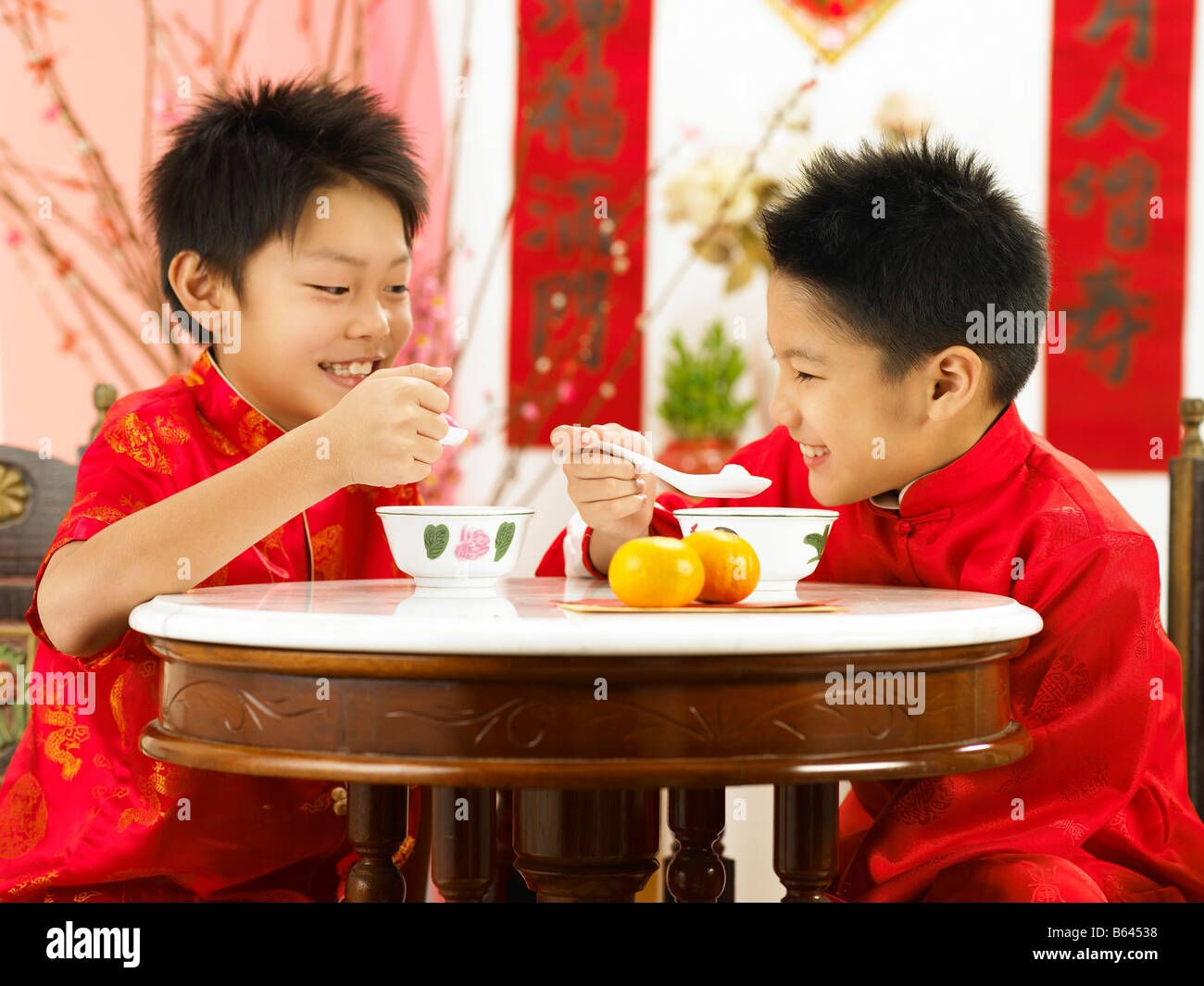 Happy boy eating rice hi-res stock photography and images - Alamy