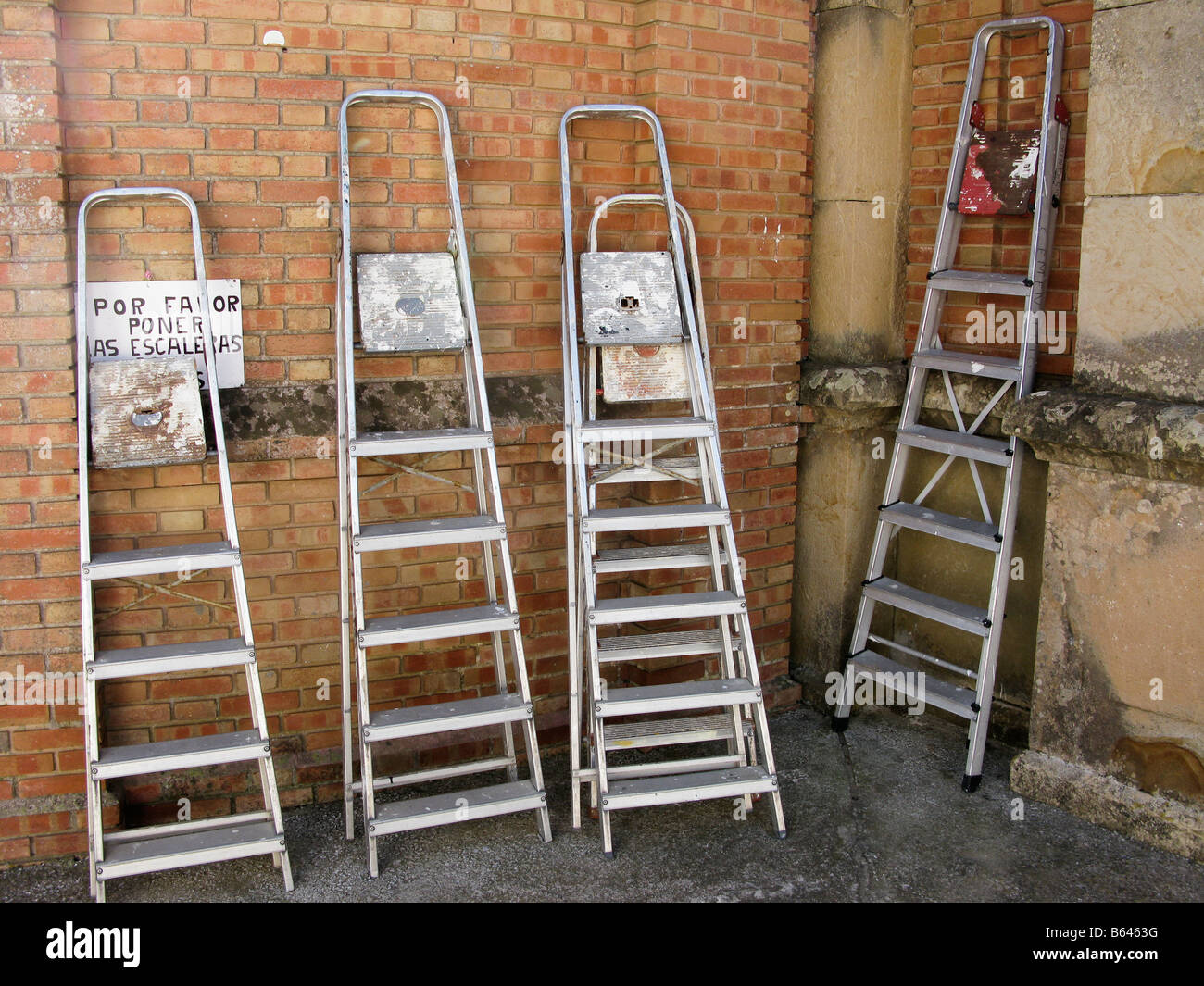 Ladder leaning against brick wall hi-res stock photography and images ...