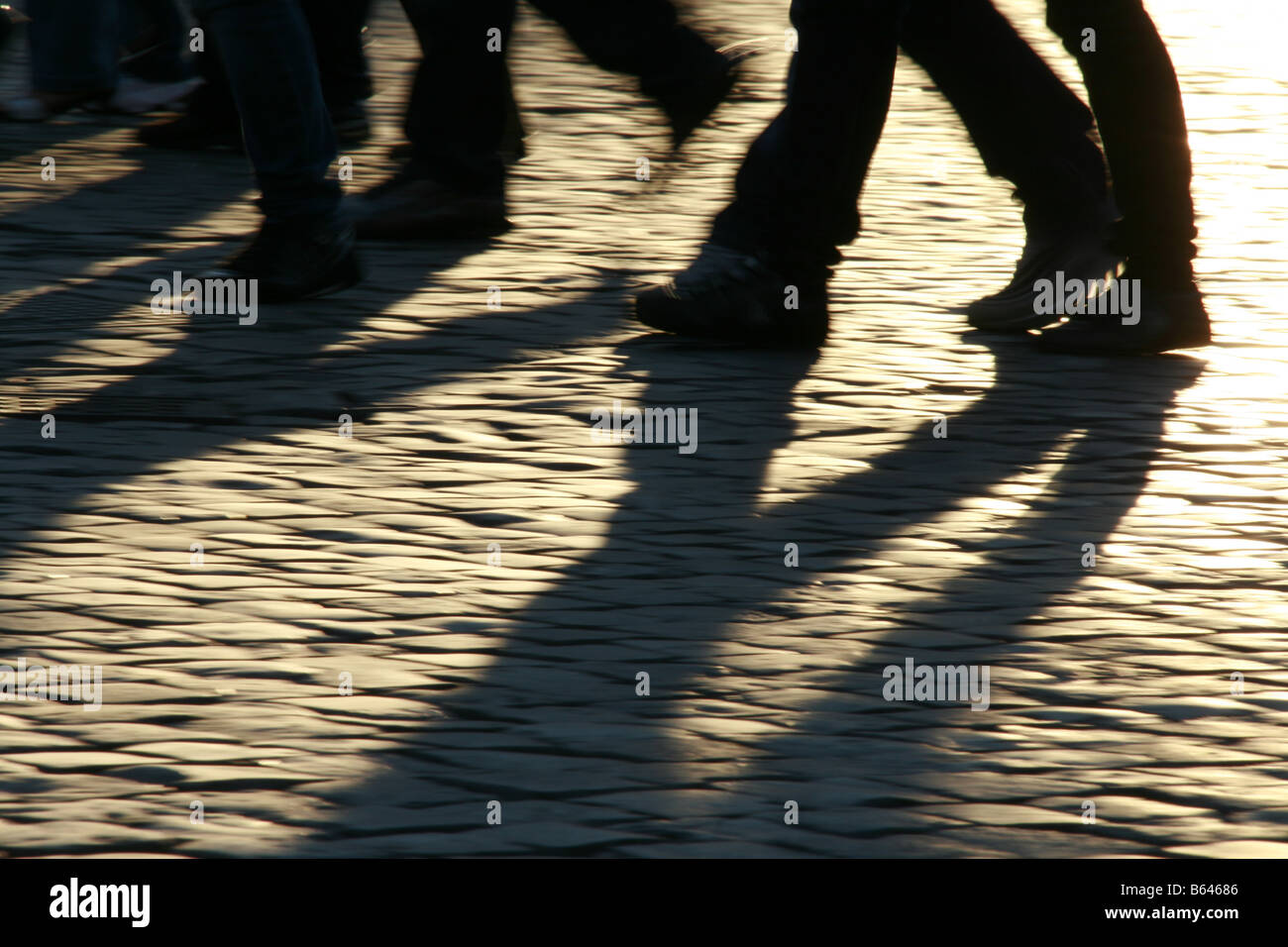 shadow people fast speed feet legs walking in street in town Stock ...