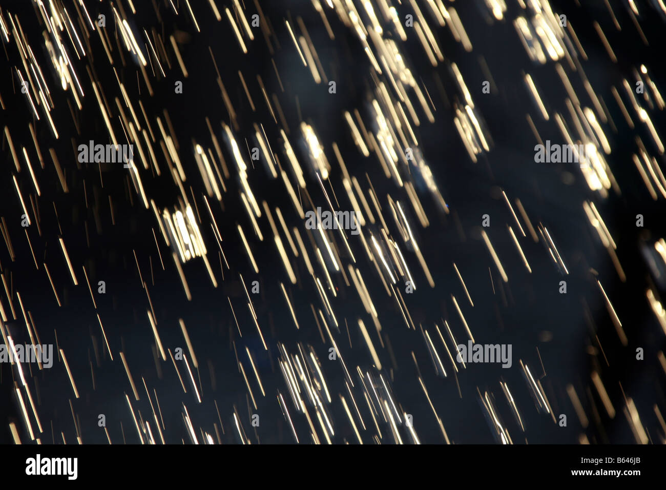abstract many water drops falling from fountain in sun Stock Photo - Alamy