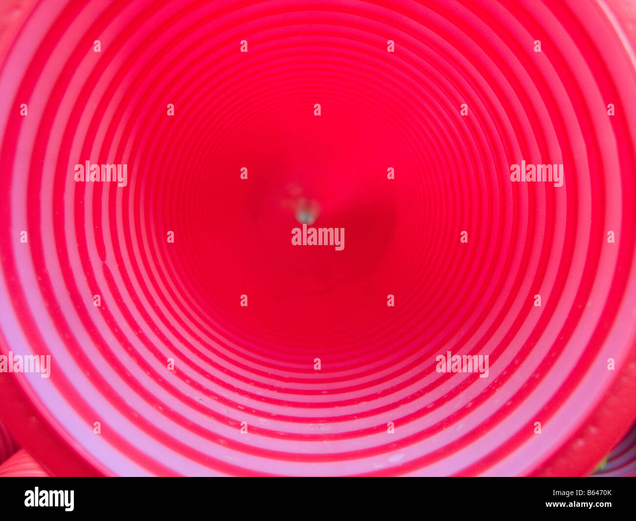 Red electrical tubes Stock Photo - Alamy