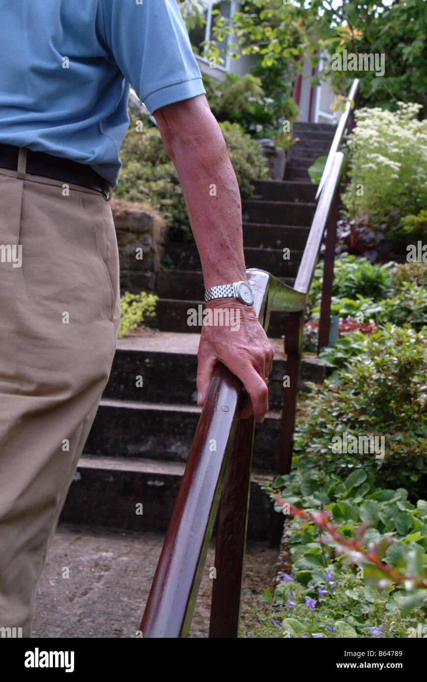 Cropped shot of an elderly man's hand holding onto a railing Stock ...