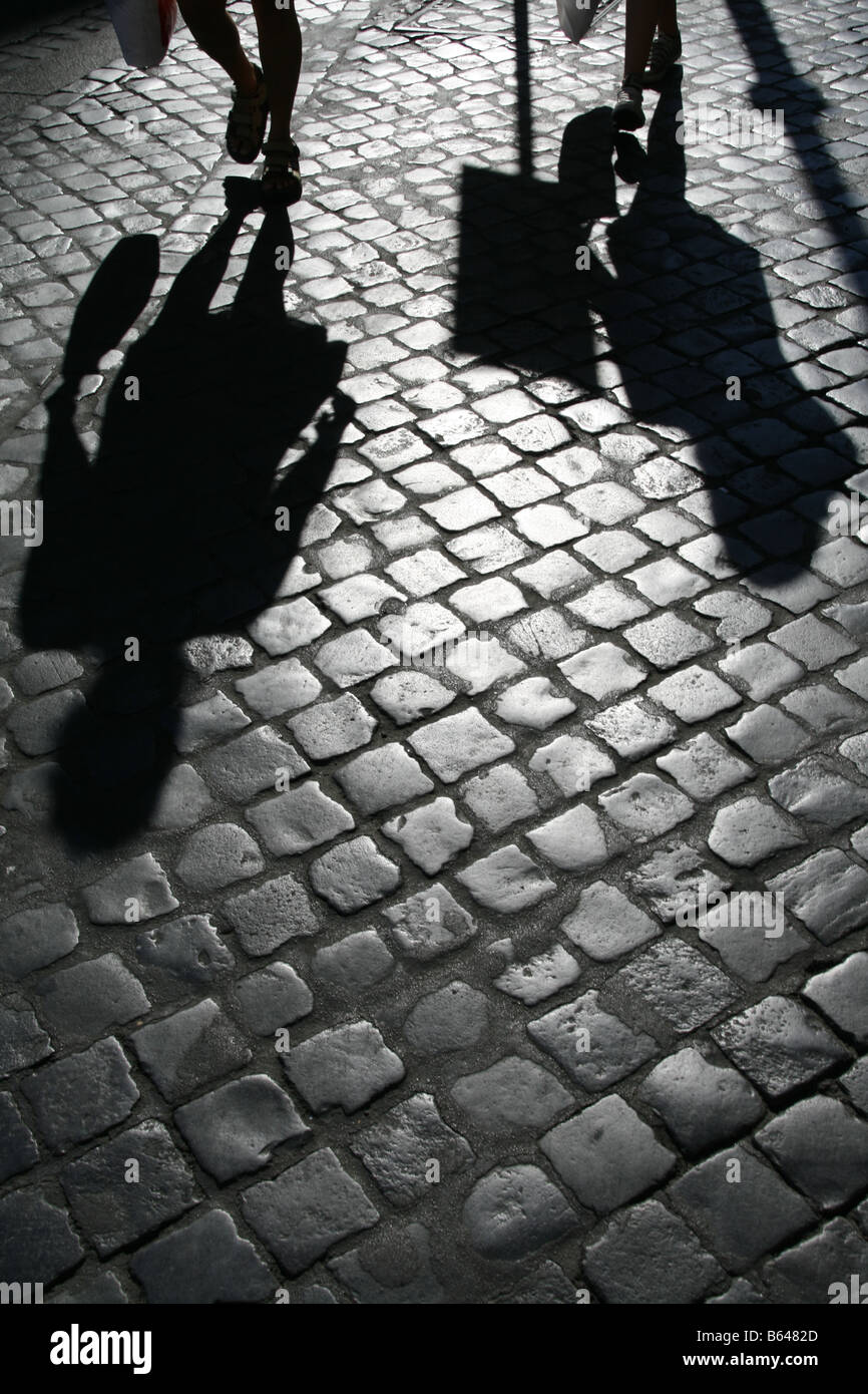 road sign notice shadow on street road in city town Stock Photo - Alamy