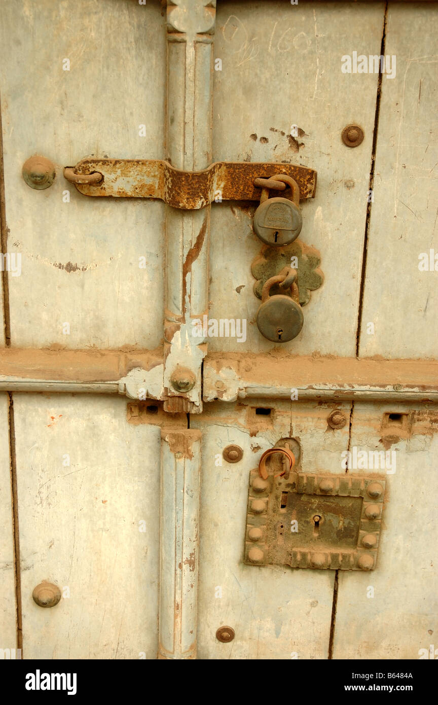 Rusty old door lock in India Stock Photo - Alamy