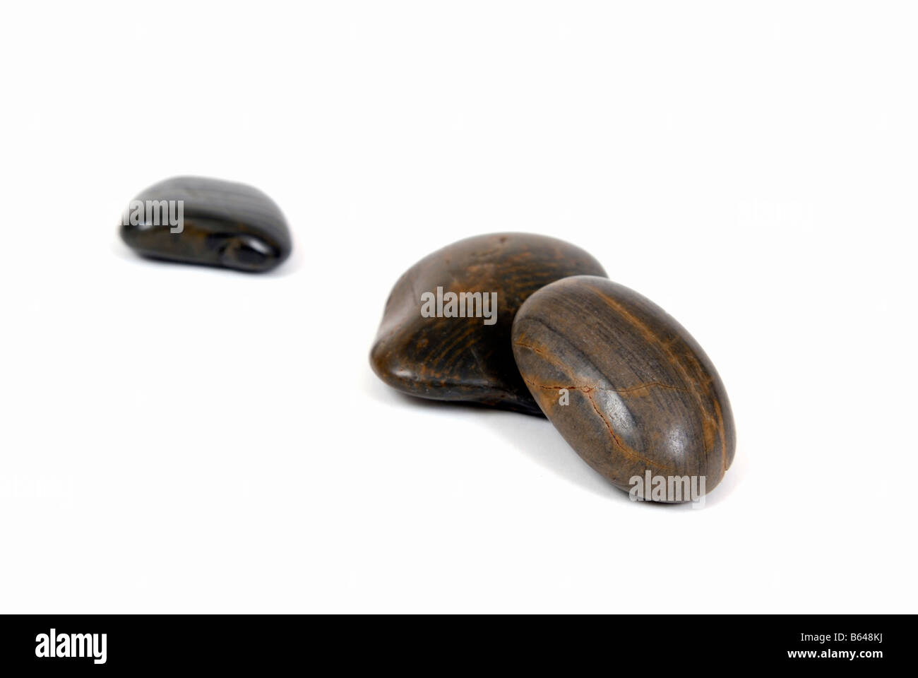 Shiny pebbles photographed against a white background. Would look good ...